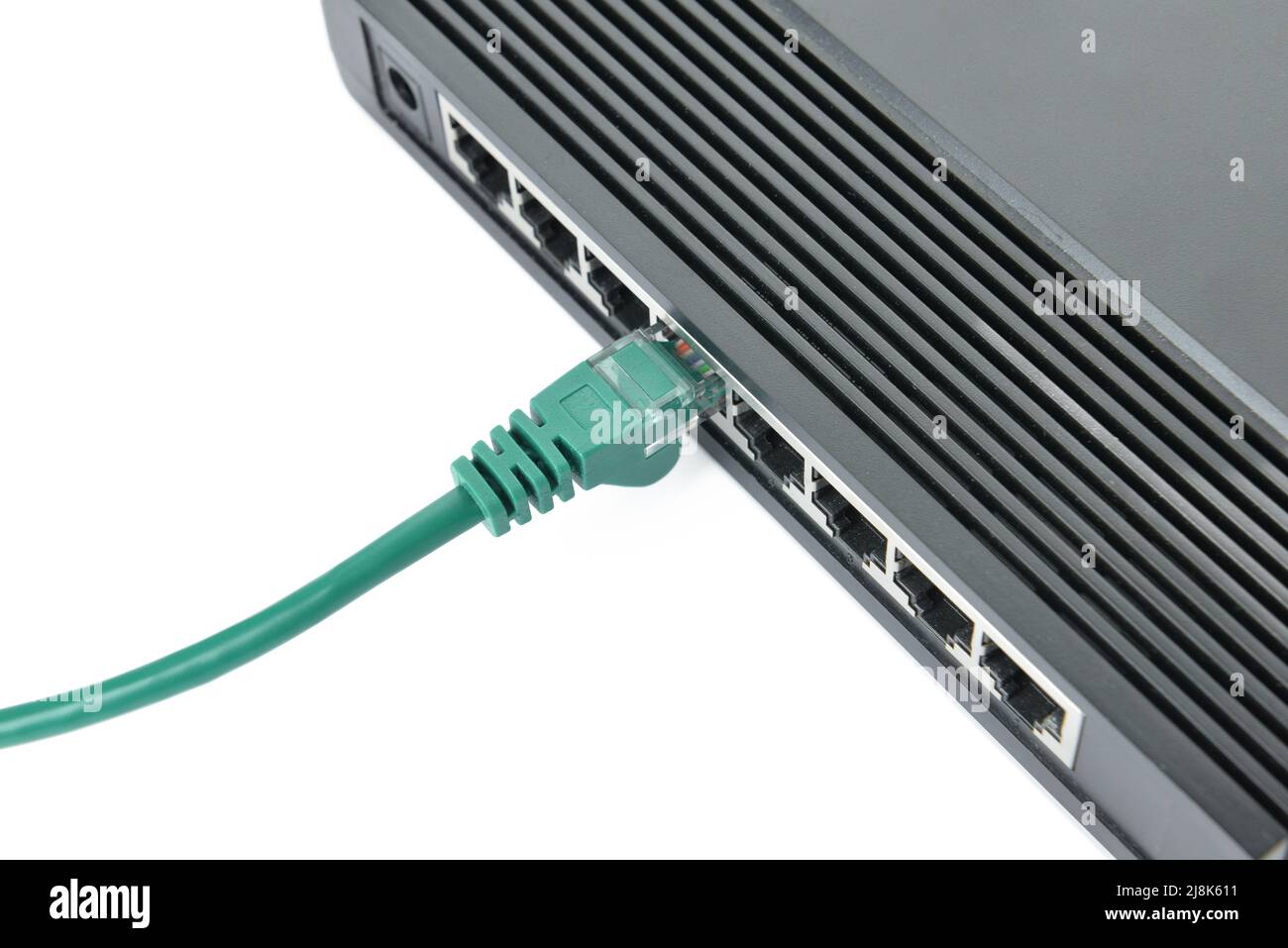 Modern wi-fi router and internet cable isolated on white background ...