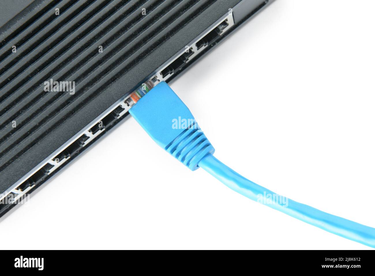 Modern wi-fi router and internet cable isolated on white background ...