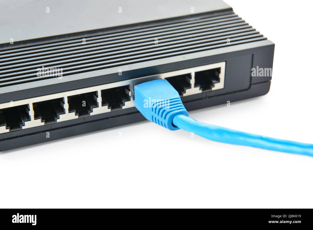 Modern wi-fi router and internet cable isolated on white background ...