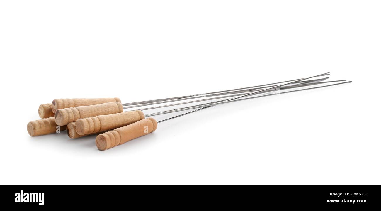 Wooden skewers with handle on white background Stock Photo - Alamy