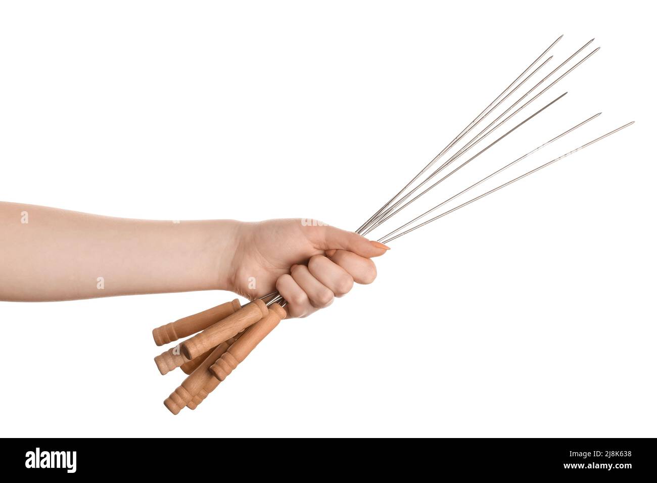 Female hand with wooden skewers on white background Stock Photo - Alamy
