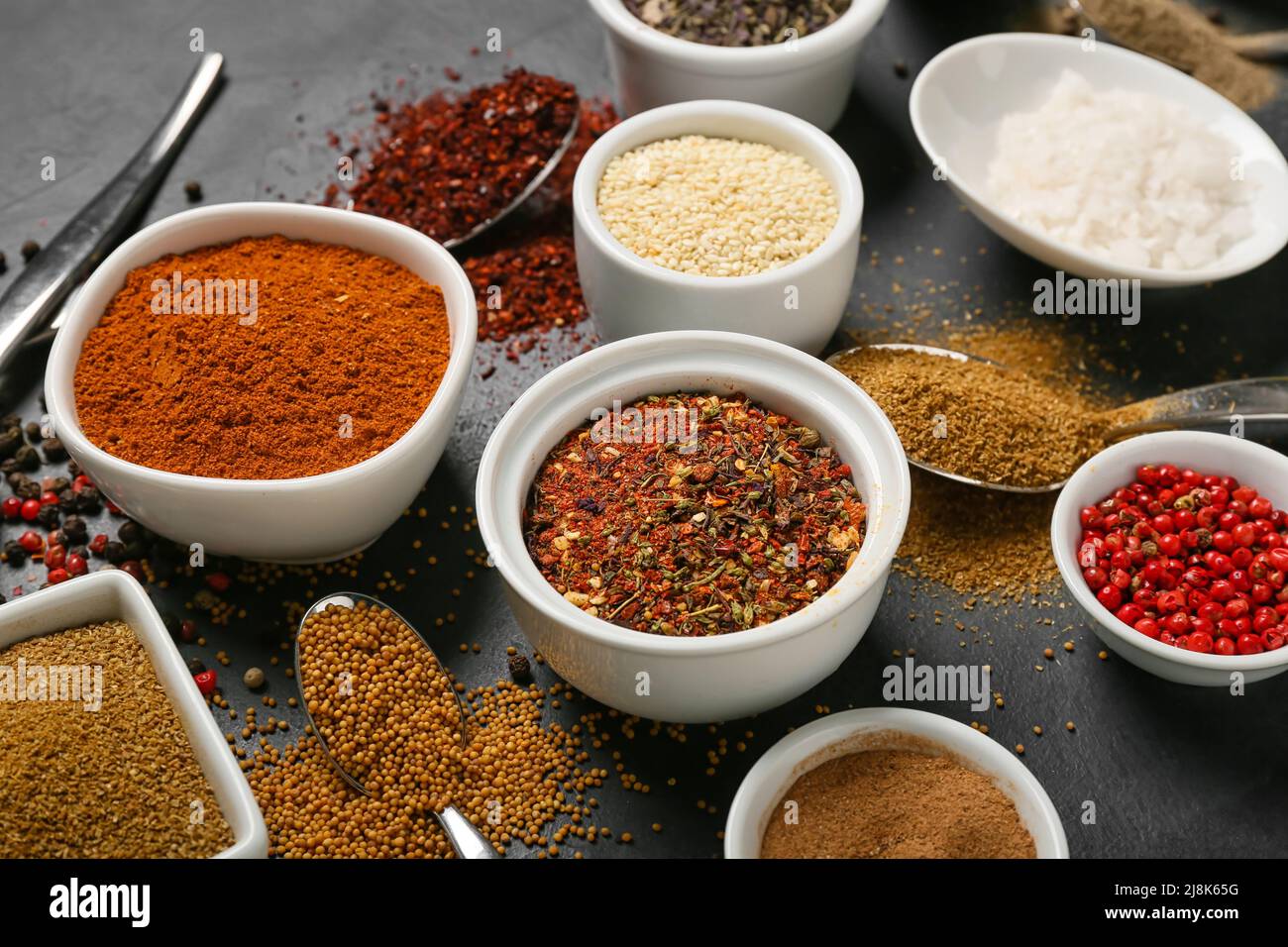 Set of aromatic spices on dark background, closeup Stock Photo - Alamy