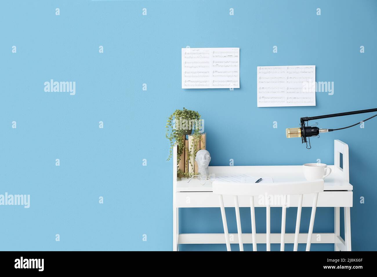 Modern workplace of composer and stand with professional microphone ...