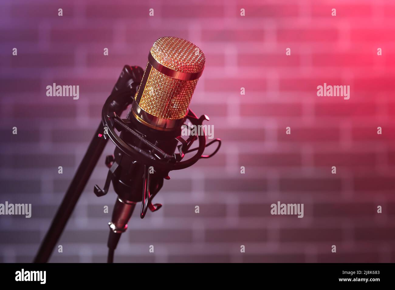 Stand microphone on brick wall hi-res stock photography and images - Alamy