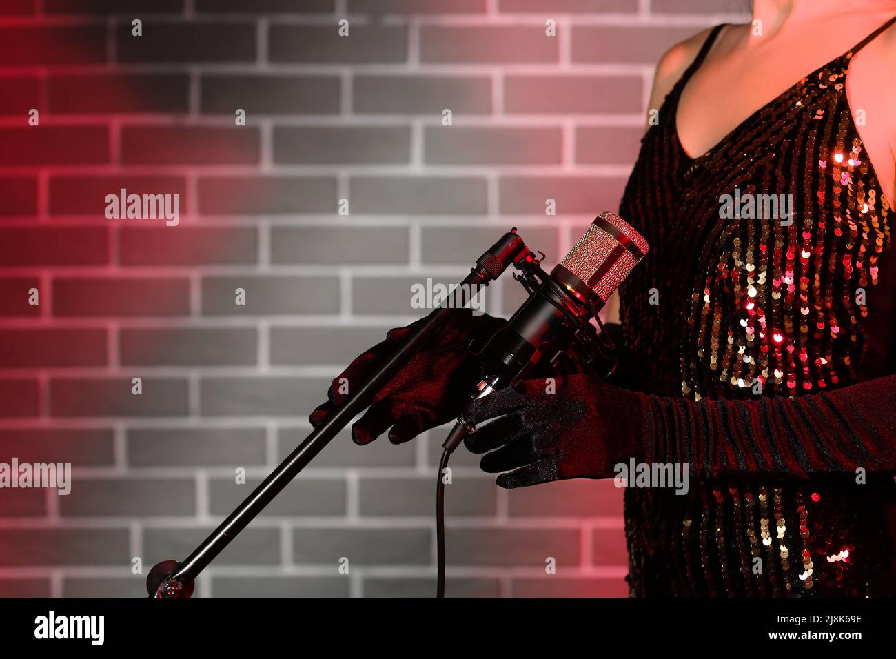 Female singer microphone elegant black hi-res stock photography and ...