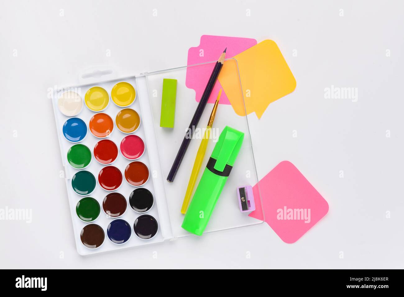 Paints, paper note sticks, marker and pencil on white background Stock ...