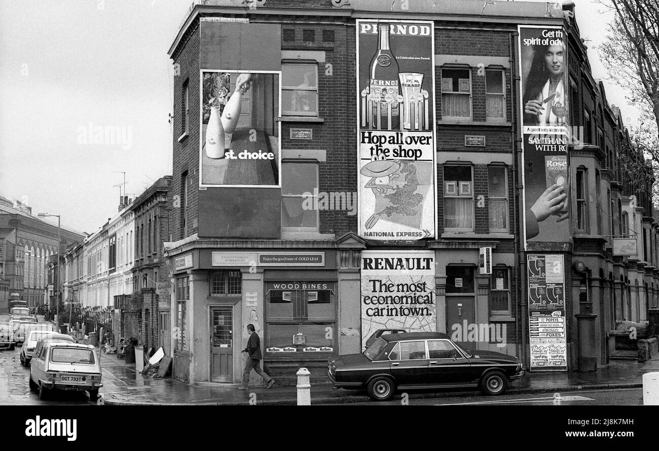 Street scene in London, England with building and advertising posters ...