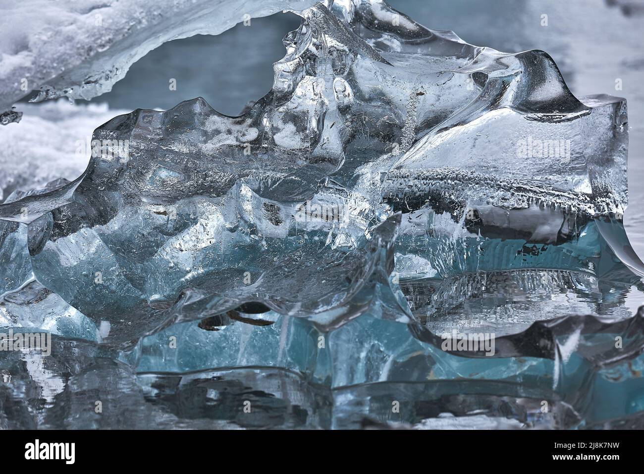 Block of glacier ice strange shaped Stock Photo - Alamy