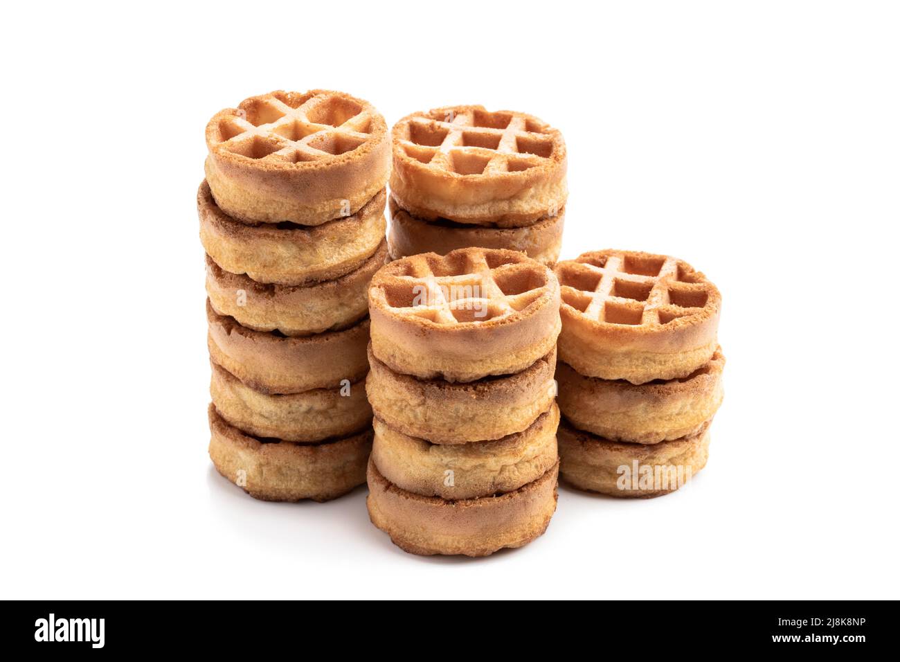 Stacks of tasty round mini waffles isolated on white Stock Photo - Alamy