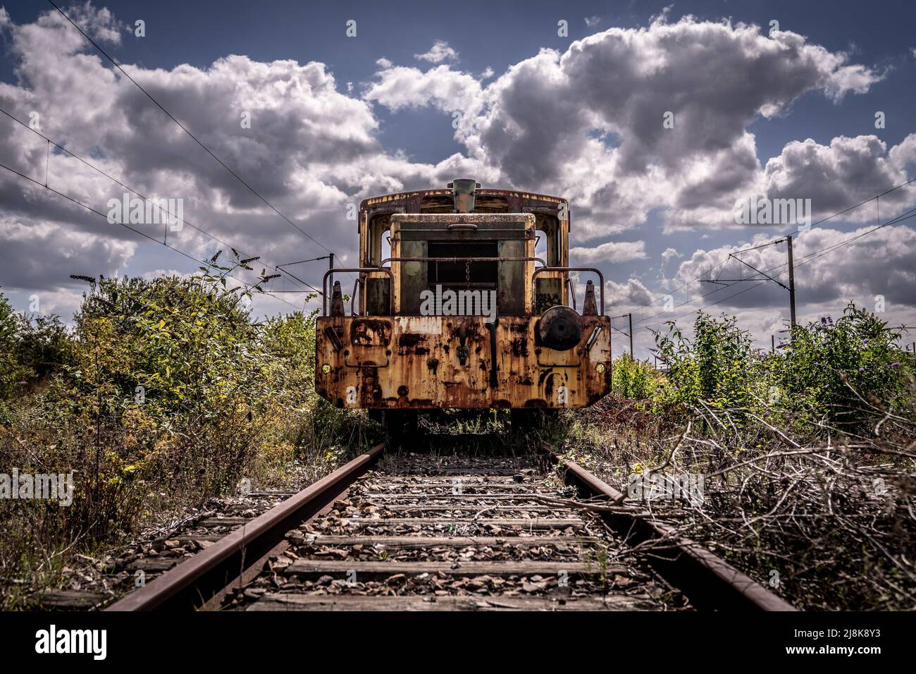 An old abandoned train at a train graveyard in France Stock Photo - Alamy
