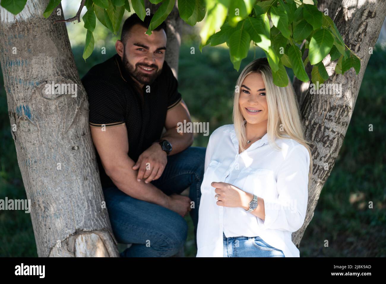 Outdoor Portrait of Young Beautiful Happy Smiling Couple Where Girl is ...