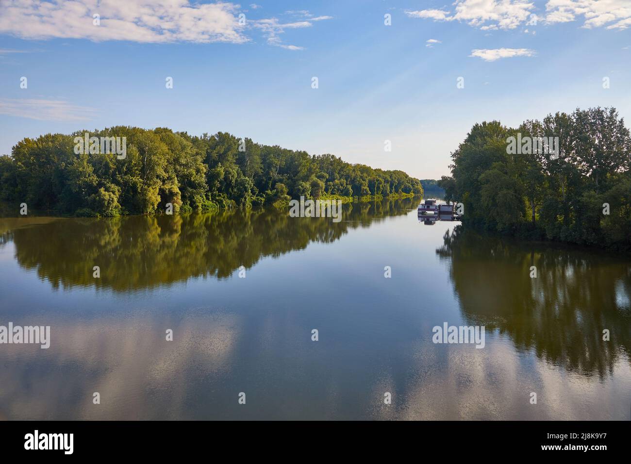 Peaceful waters of rivers merging, summer landscape Stock Photo - Alamy