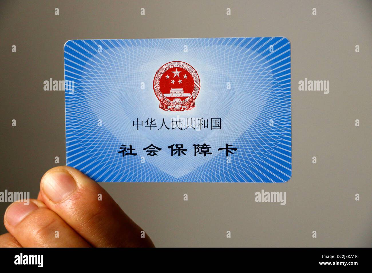 BEIJING, CHINA - MAY 5, 2022 - A resident shows a social security card ...