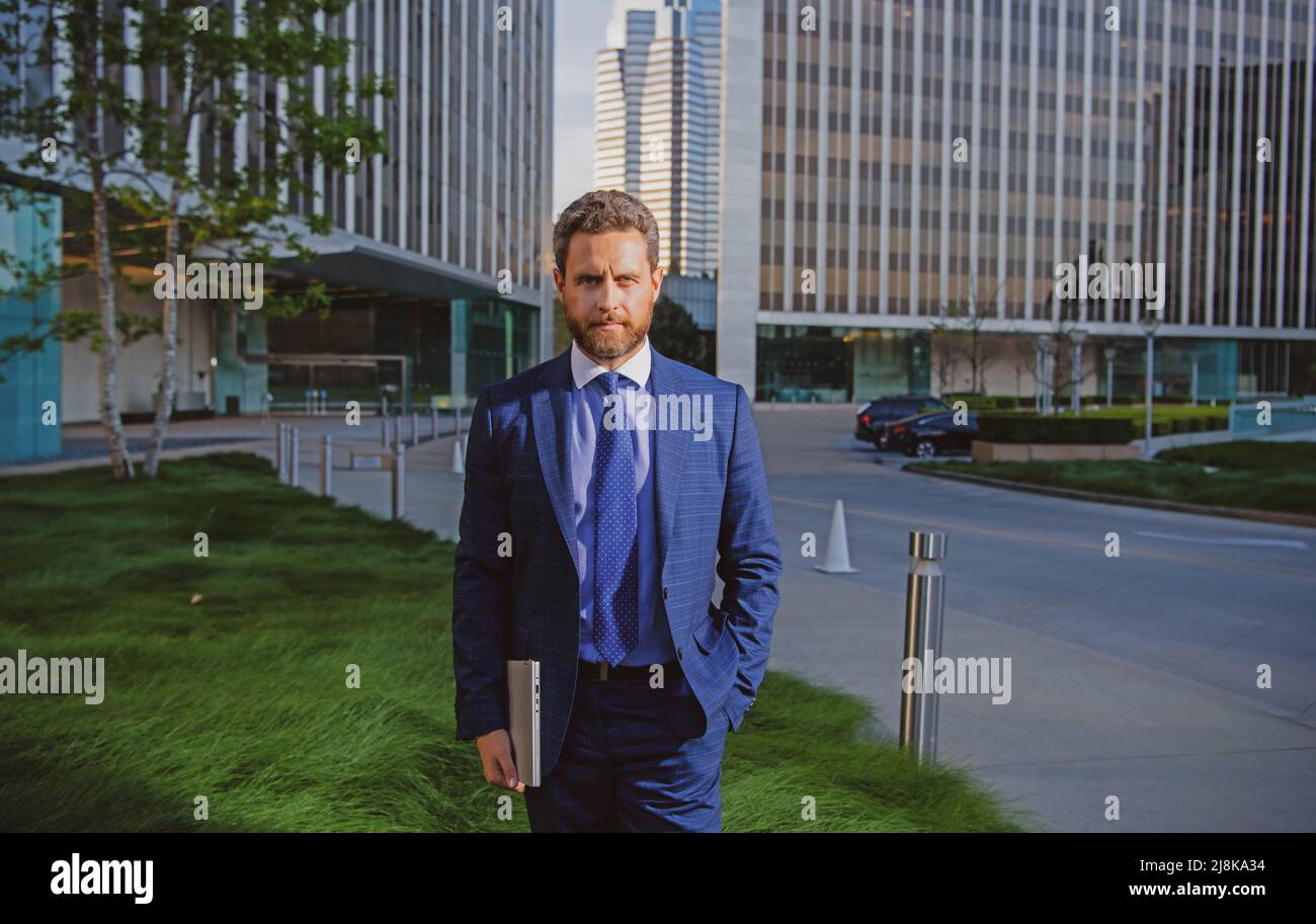 Businessman with success business. Outdoors portrait male model in suit ...