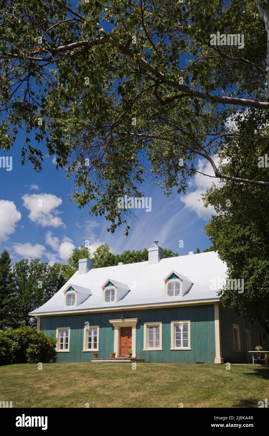 Old circa 1786 Canadiana cottage style home facade with turquoise wood ...