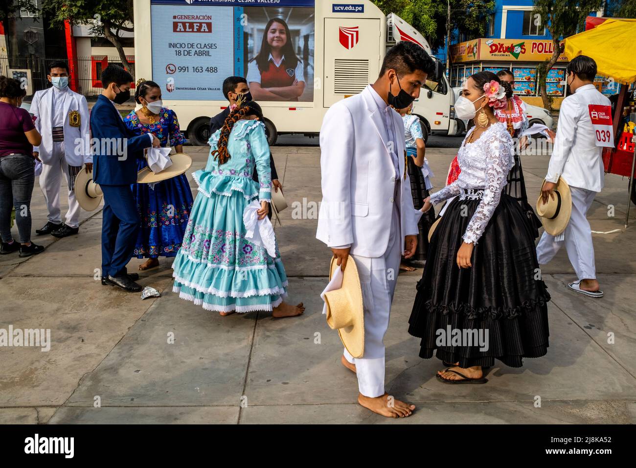 Young Peruvian Dancers In Costume Wait To Take Part In A Marinera Dance ...