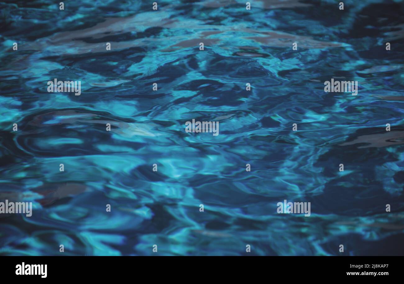 Abstract ripple wave and clear turquoise water surface in swimming pool ...