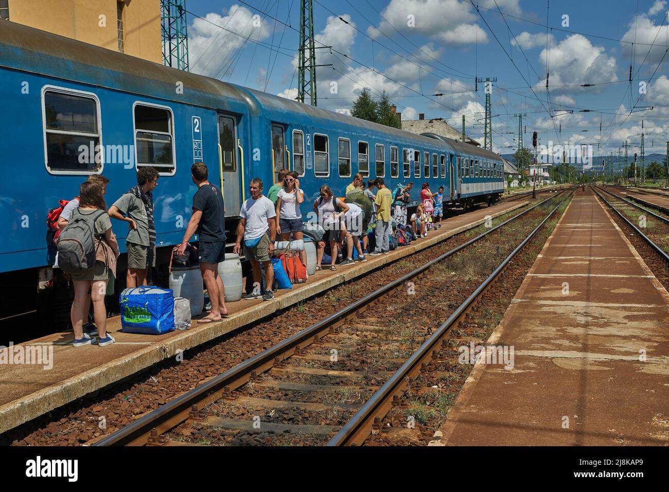Group of students boarding a train Stock Photo - Alamy