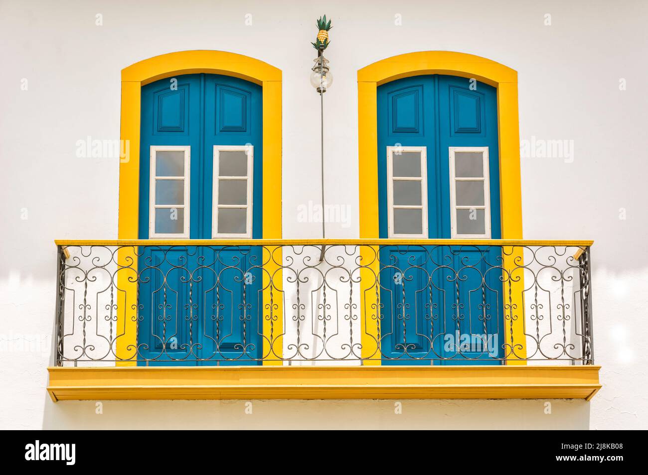 Windows and balcony of an old building in the city of Paraty, state of ...