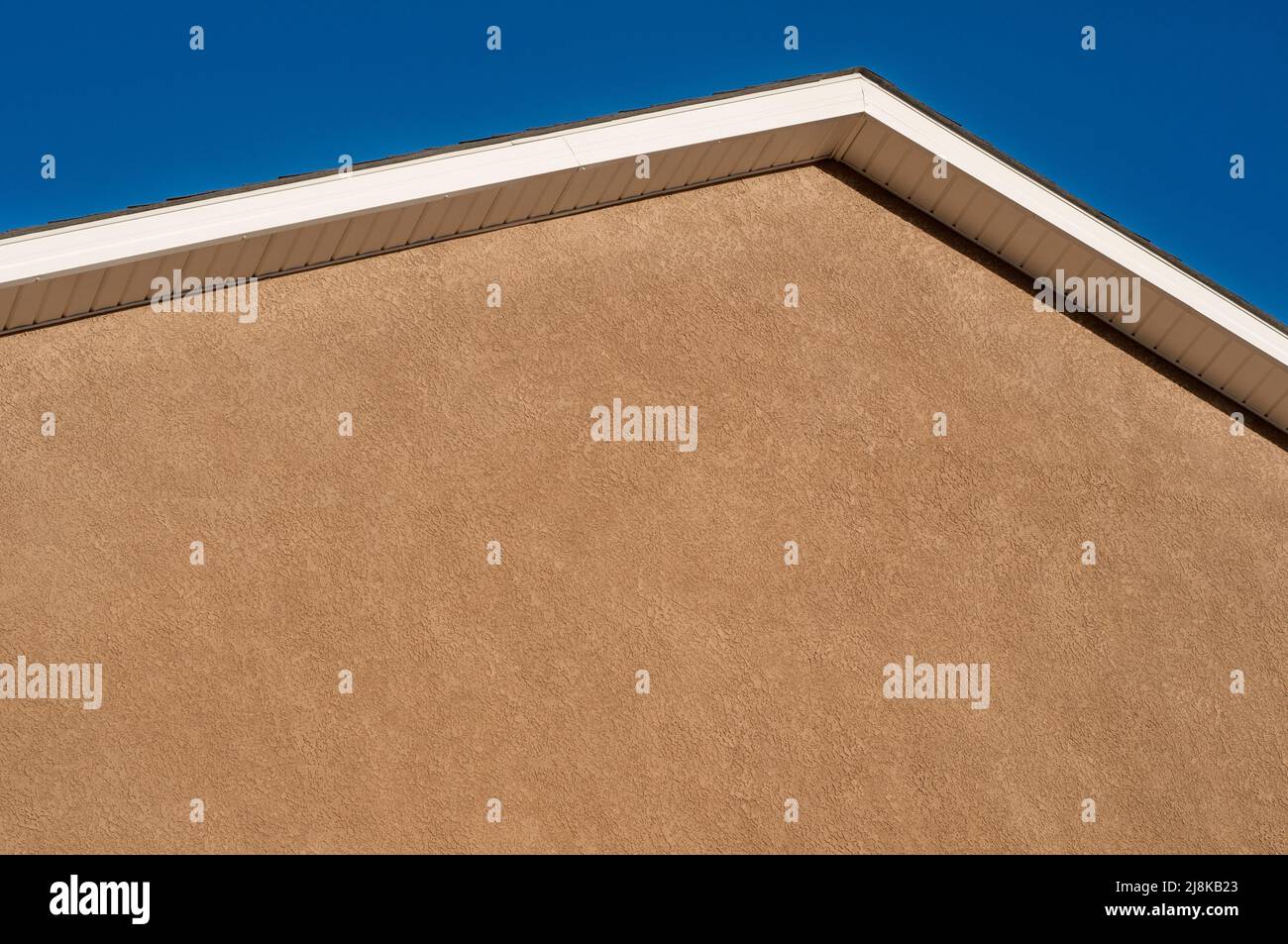 Roof eave stucco sided house hi-res stock photography and images - Alamy