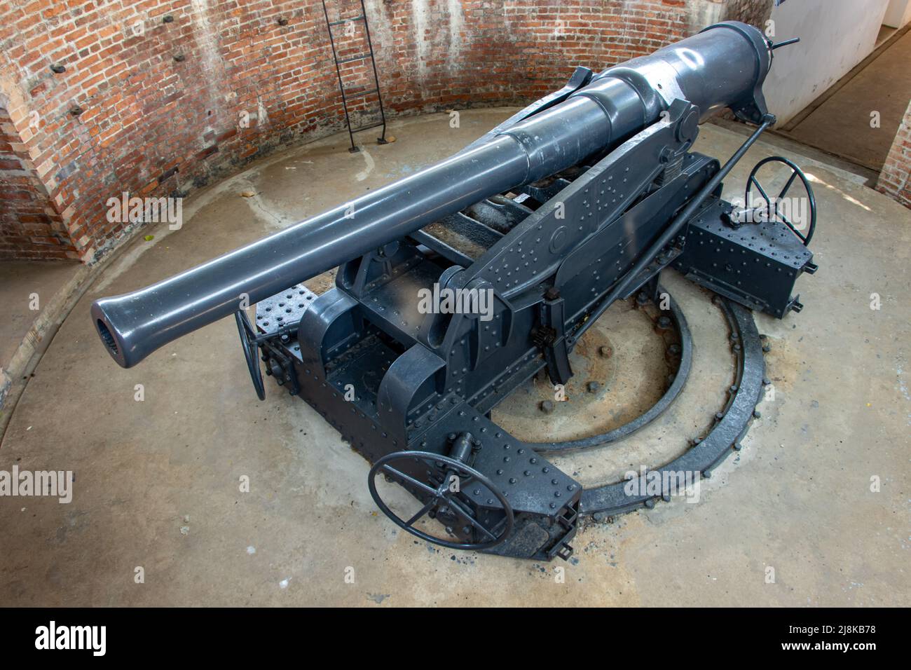 A large cannon (Armstrong cannon) inside a hidden building for coastal ...