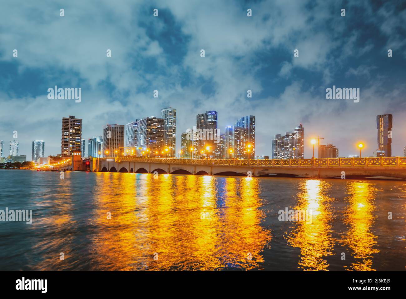Miami at sunset. Miami Florida, colorful skyline of Macarthur causeway ...