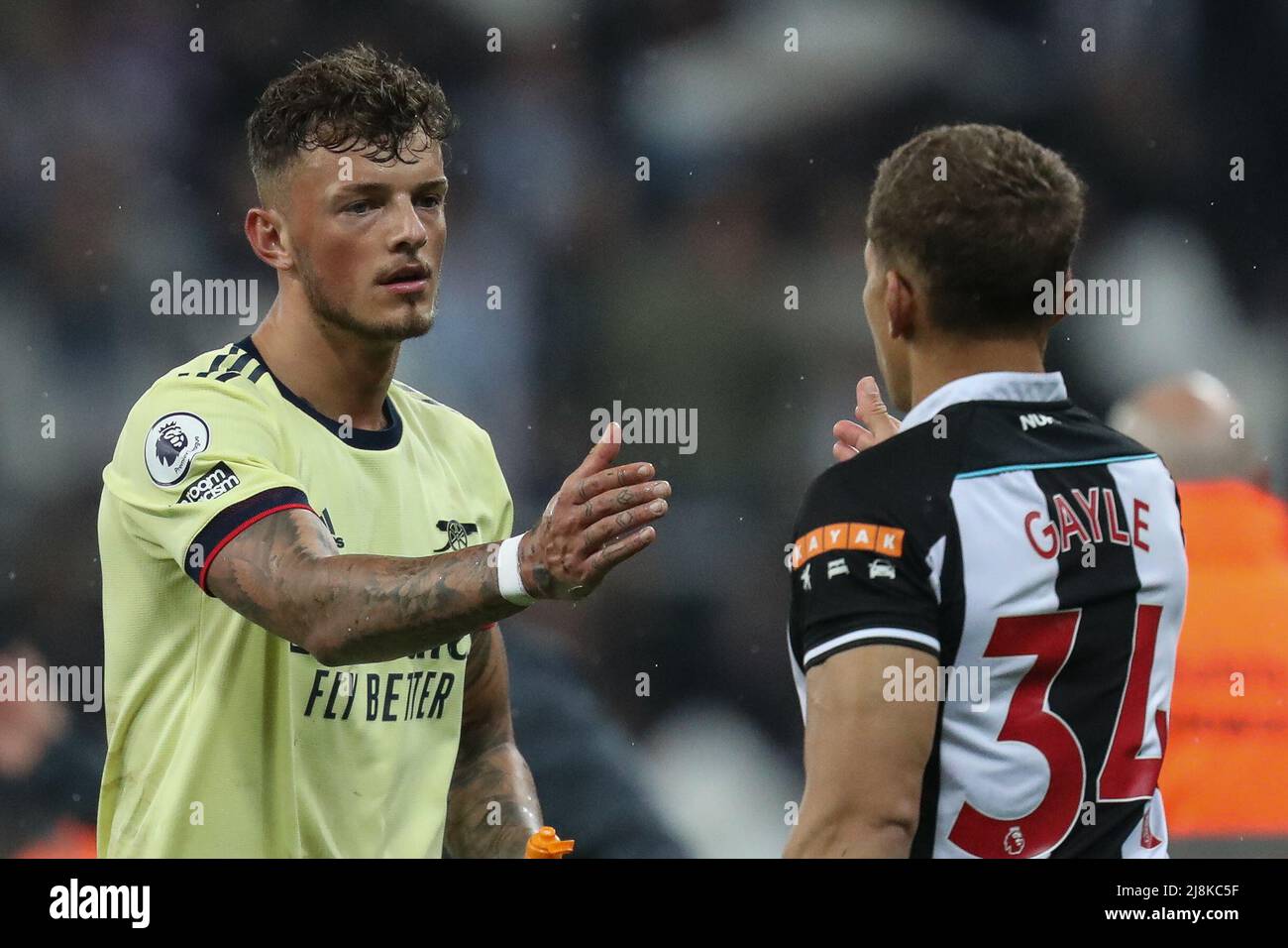 Ben White #4 of Arsenal shakes hands with Dwight Gayle #34 of Newcastle ...