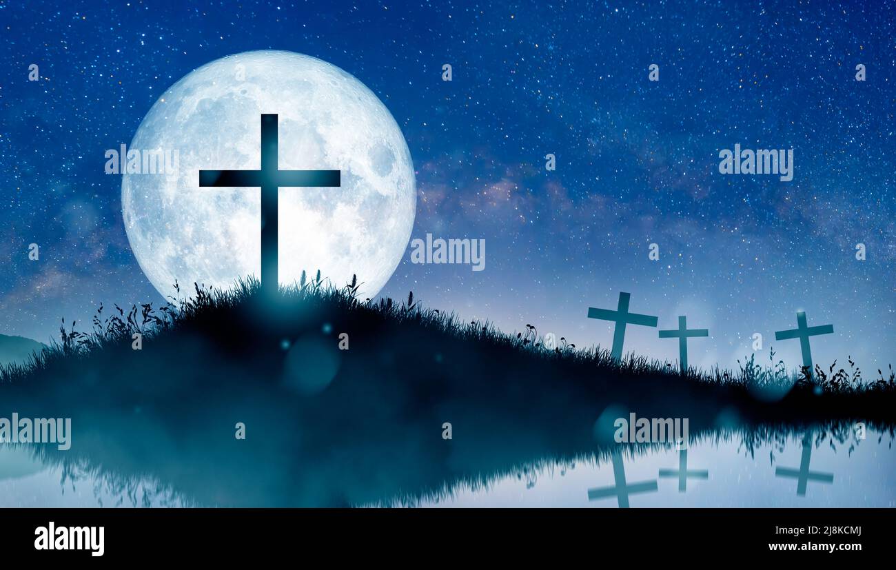 Christian cross on hill at night over the full moon. Crucifixion of ...