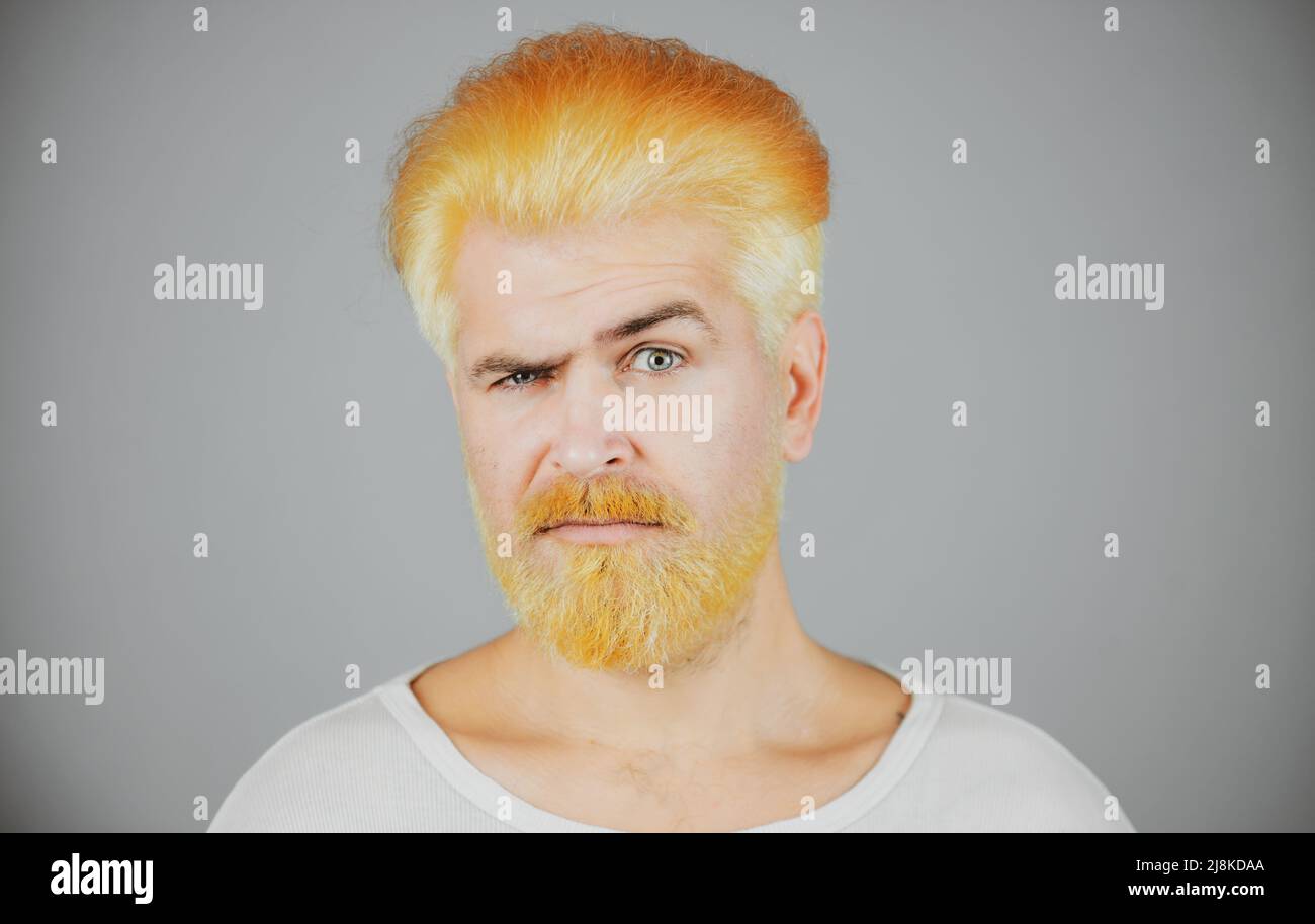 Barbershop. Dyed man hair. Blonde guy with long beard and moustache ...