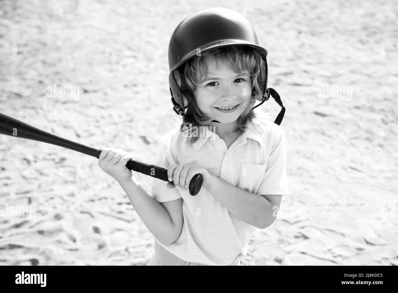Kid holding a baseball bat. Pitcher child about to throw in youth ...