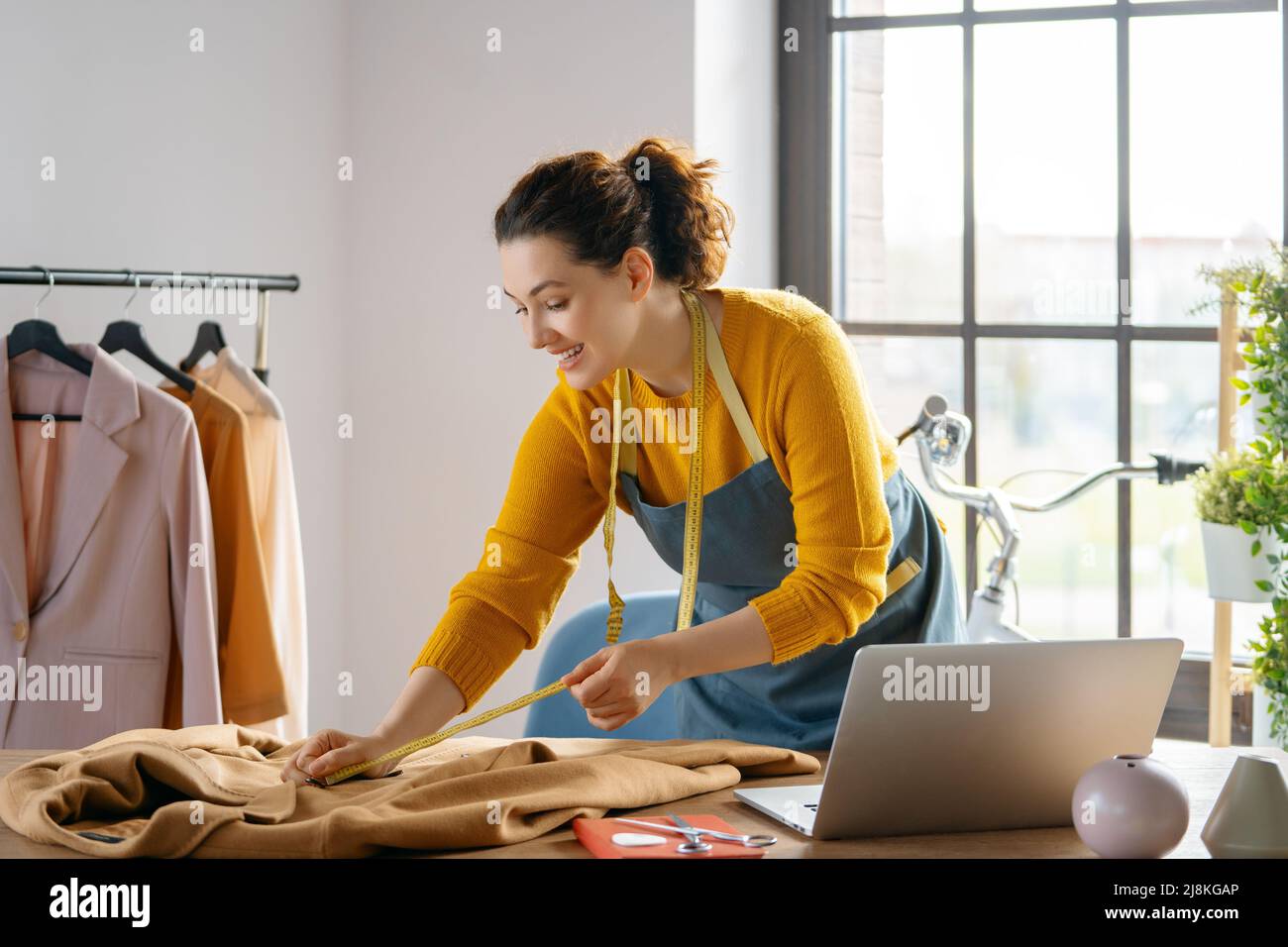 Woman is working at workshop. Concept of small business Stock Photo - Alamy