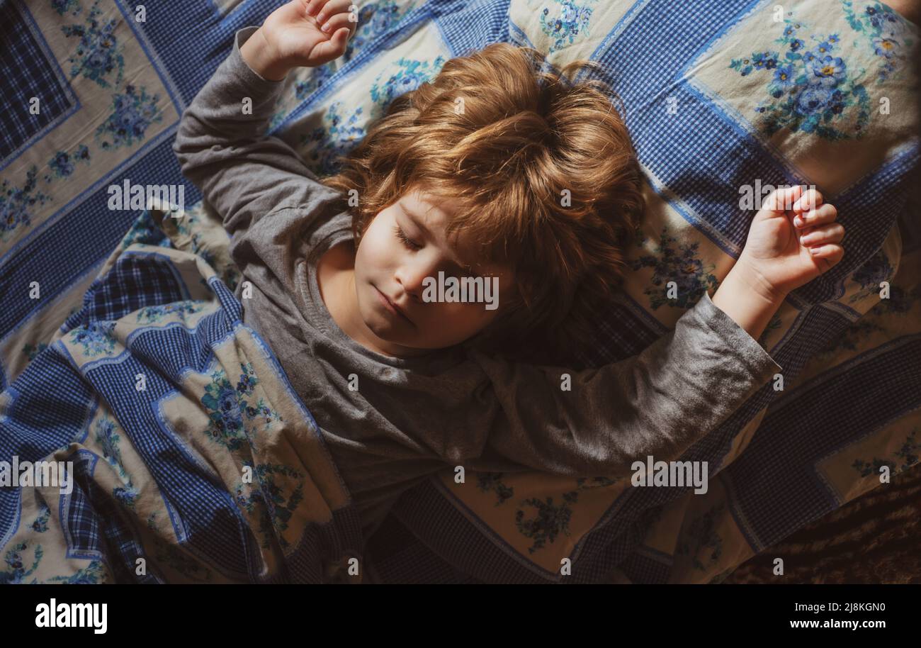 Child sleeping in the bed. Quiet sleep. Comfortable children sleepy at ...