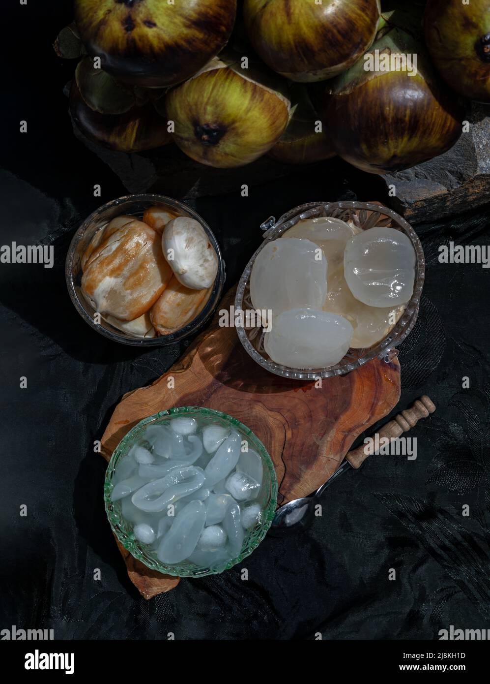 Sliced sweet fresh toddy palm with syrup and shaved ice in glass bowl ...