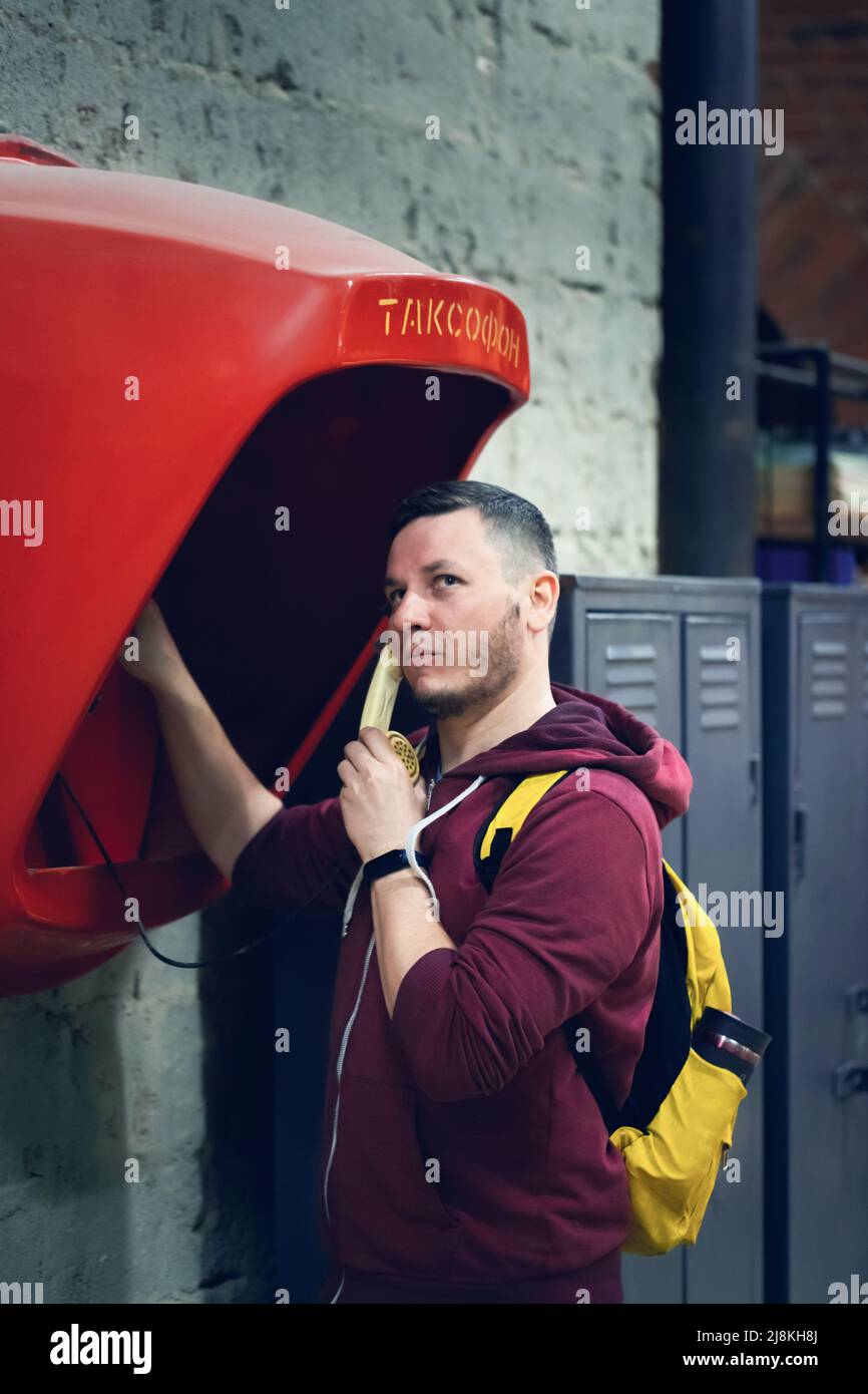 Using a public payphone hi-res stock photography and images - Alamy