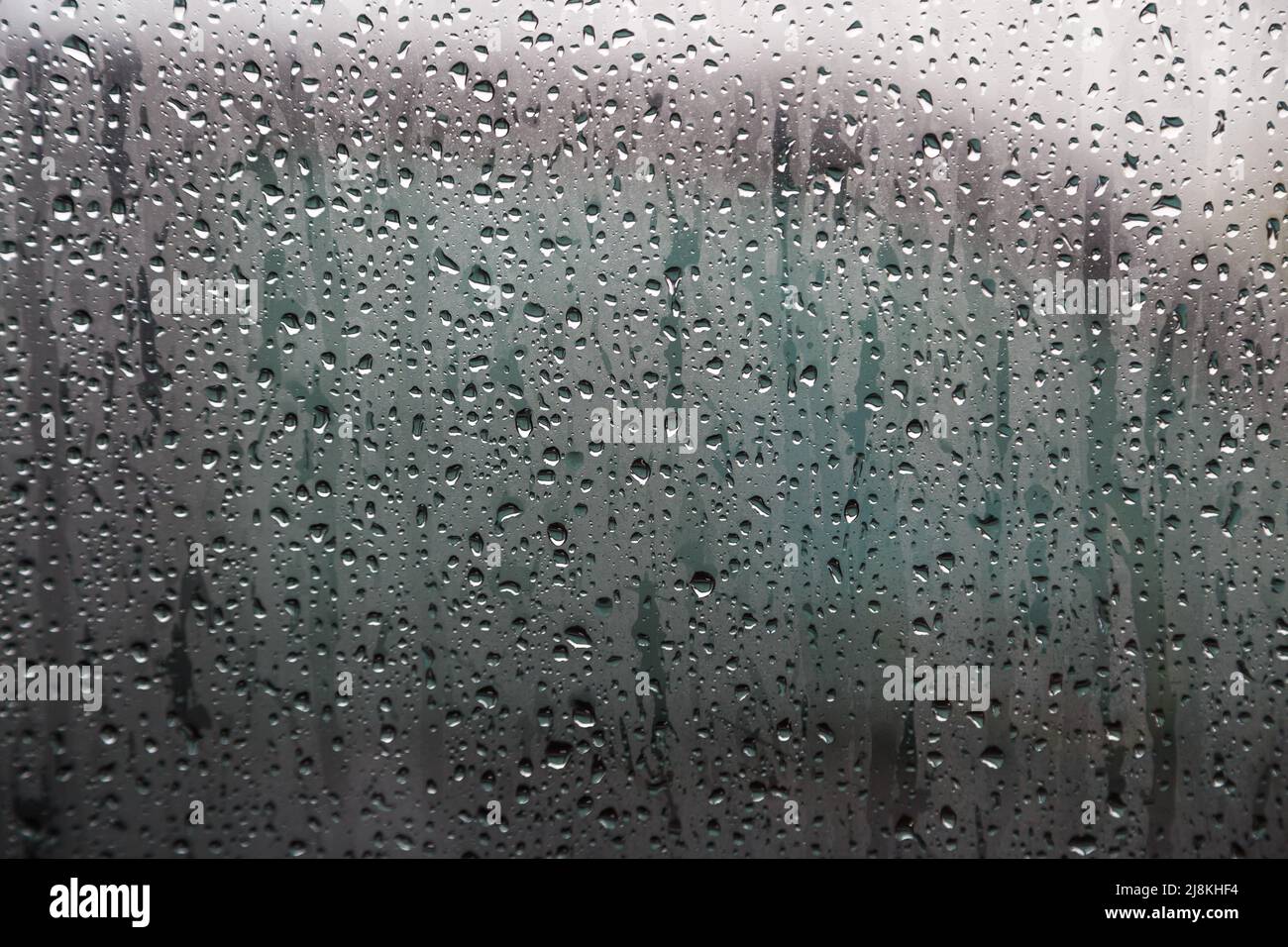 Water drop on glass windows background Stock Photo - Alamy
