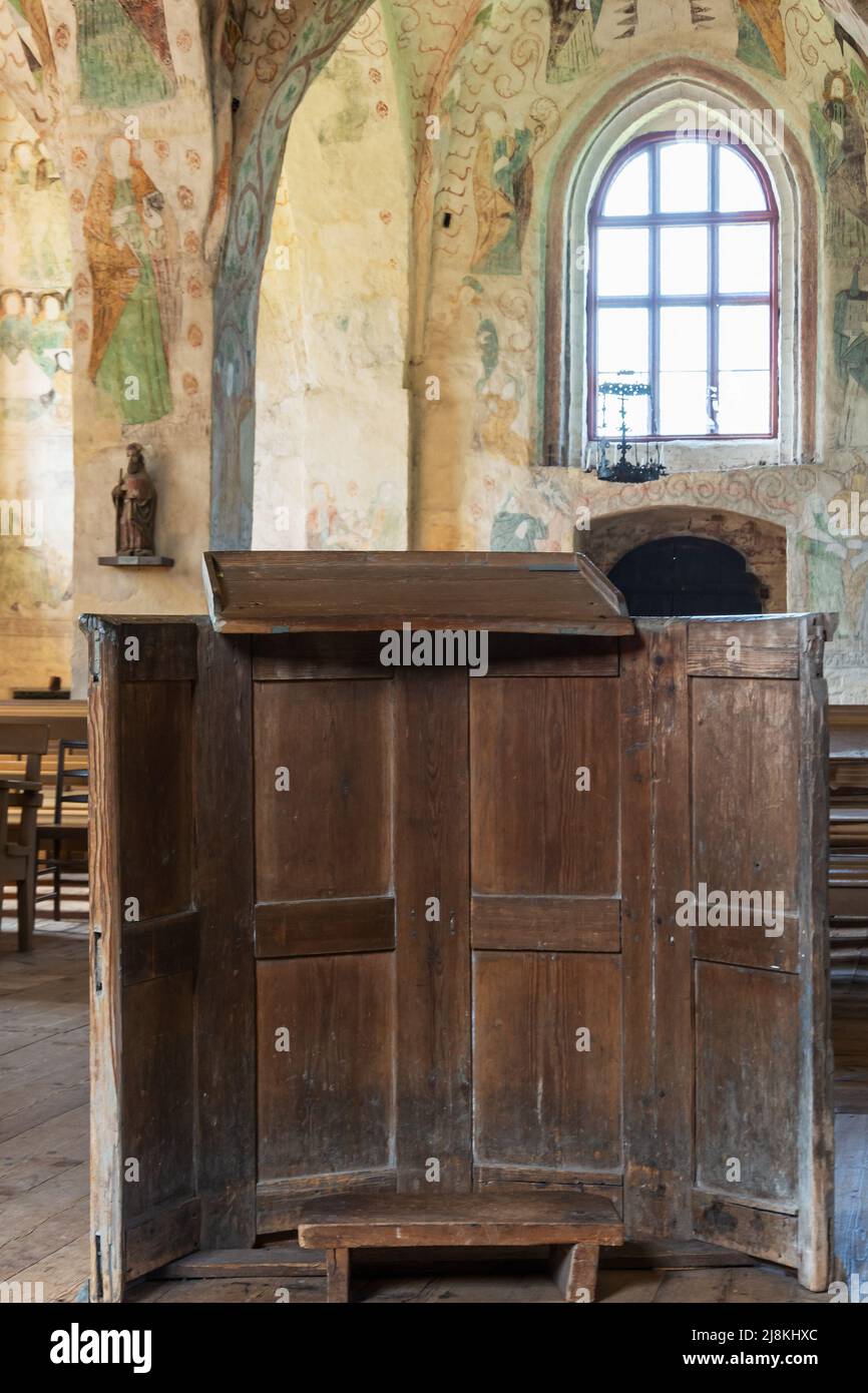 old wooden pulpit in medieval stone church in Hattula Finland Stock ...