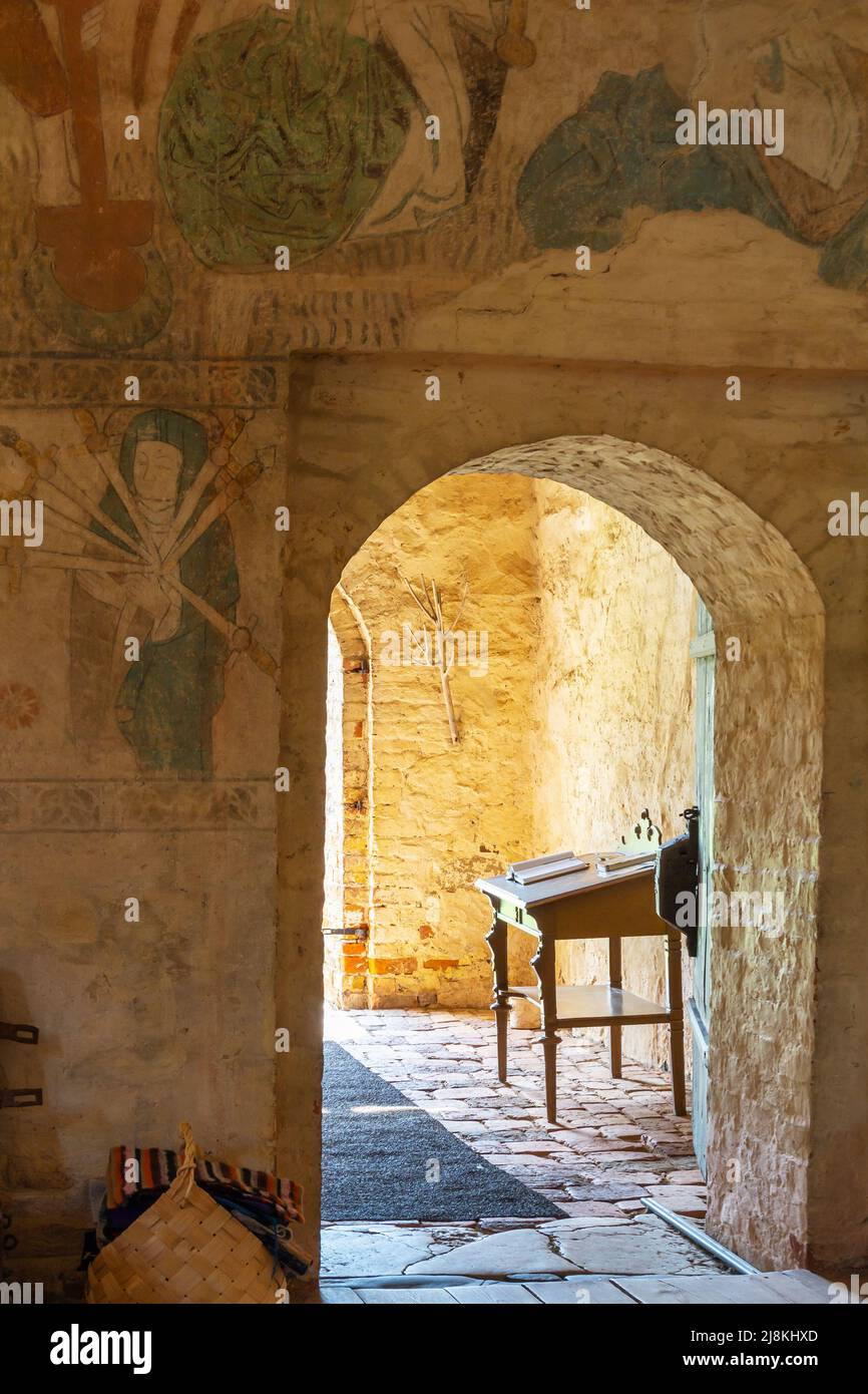 Desk in a small entry room in medieval stone church in Hattula Finland ...