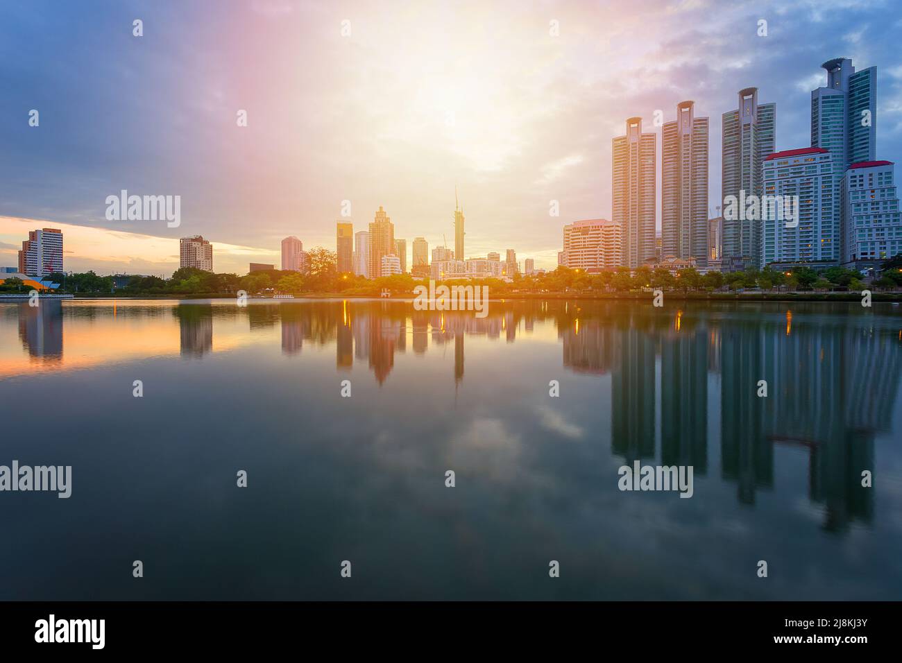 City building with water reflection before sunset background Stock ...