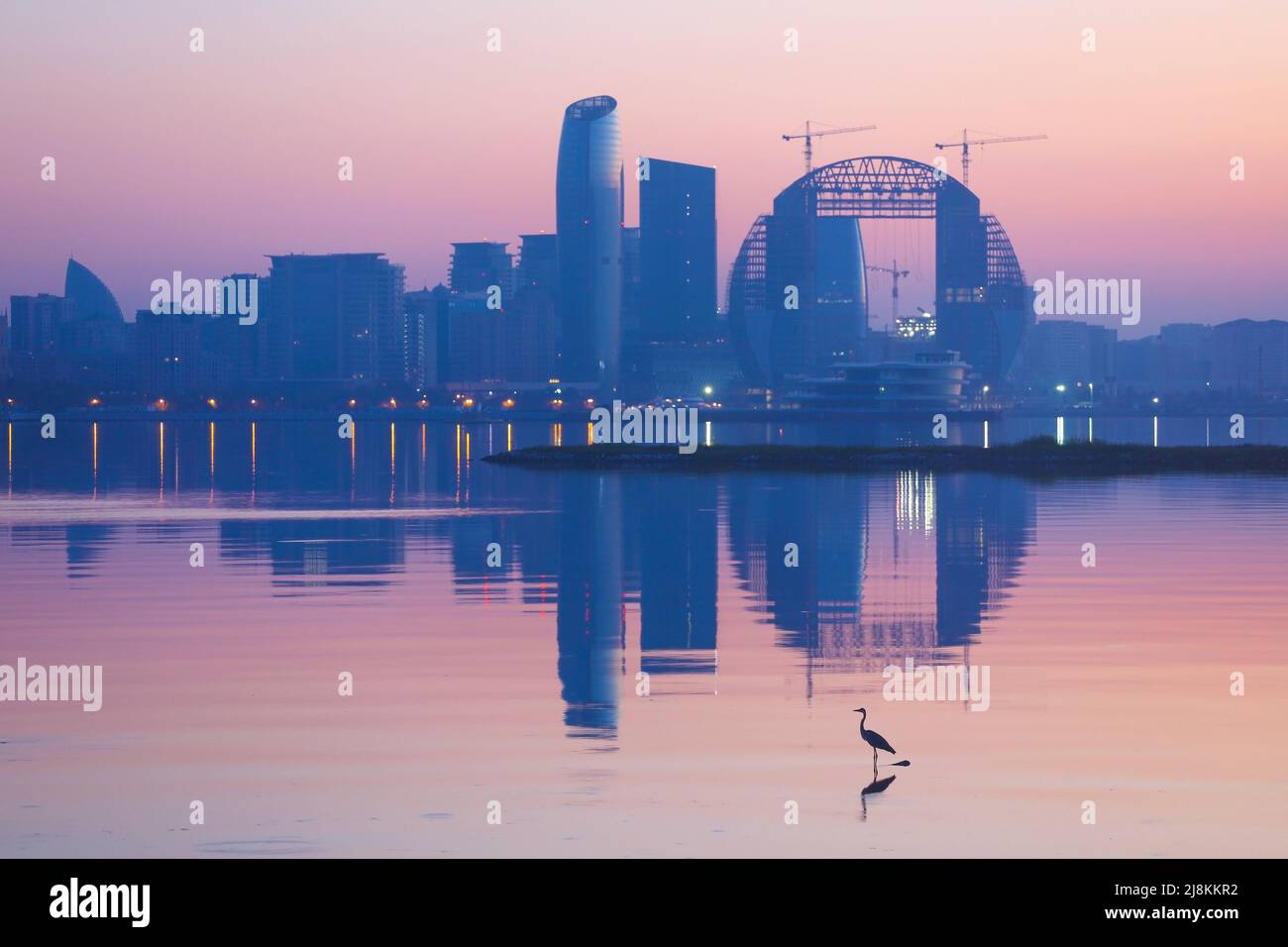 The heron hunts for fish in the sea. Baku city. Azerbaijan Stock Photo ...