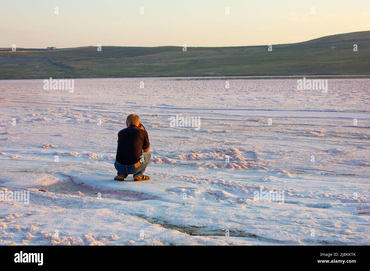 The photographer takes pictures of the salt on the lake. Baku ...