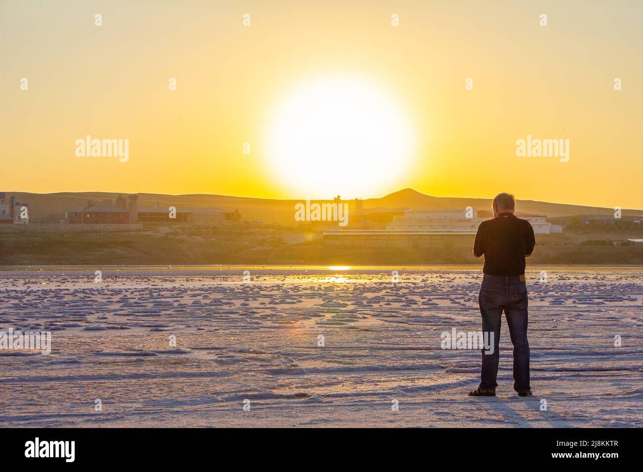 The photographer takes pictures of the salt on the lake. Baku ...