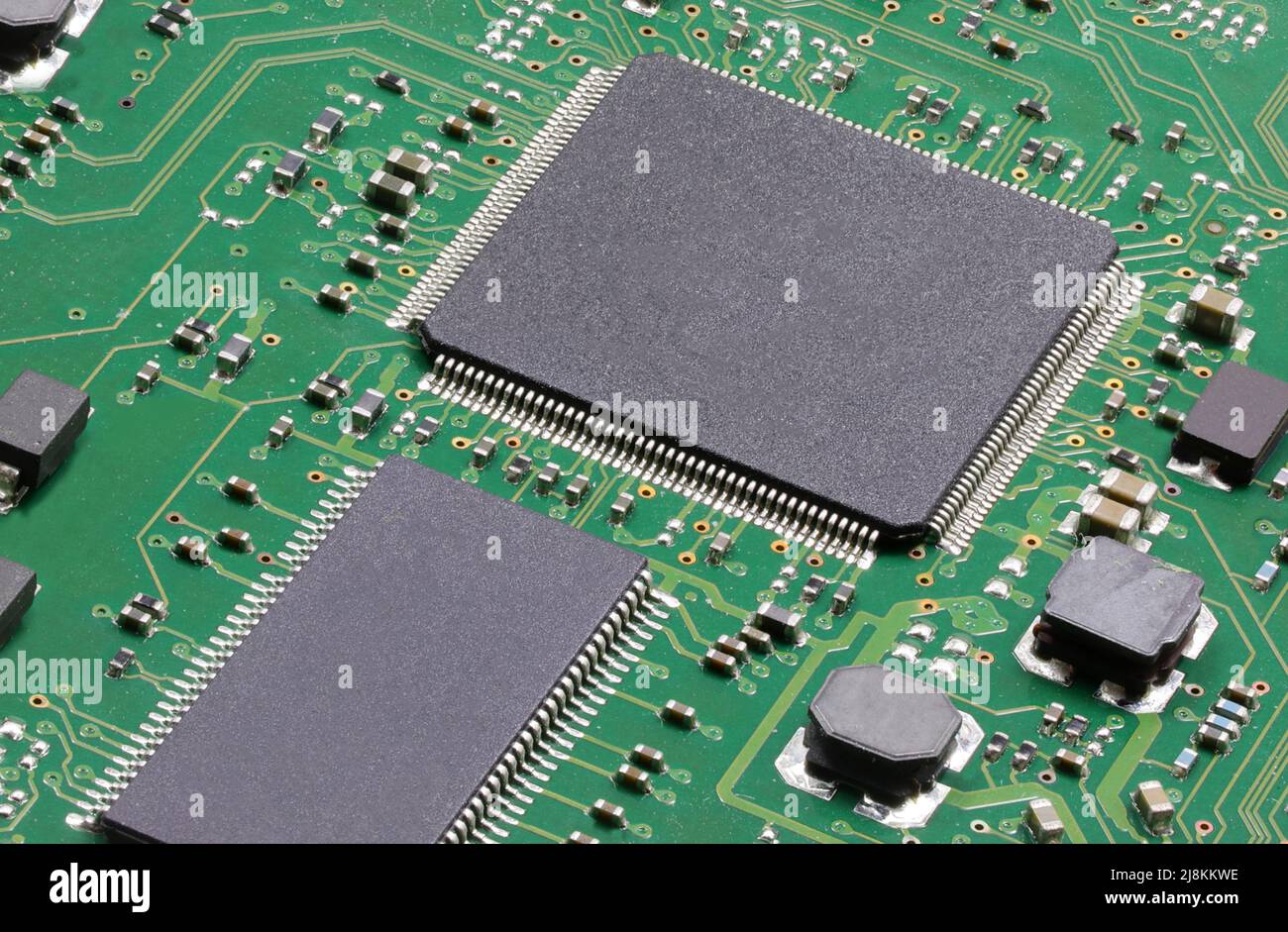 green electronic board with transistor microchip integrated circuits ...