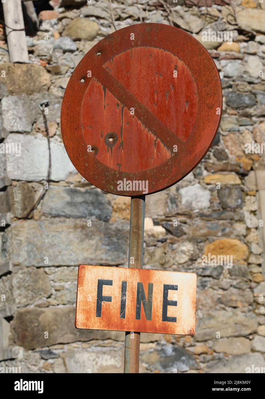old Road sign with text FINE that means THE END in italian langauge ...