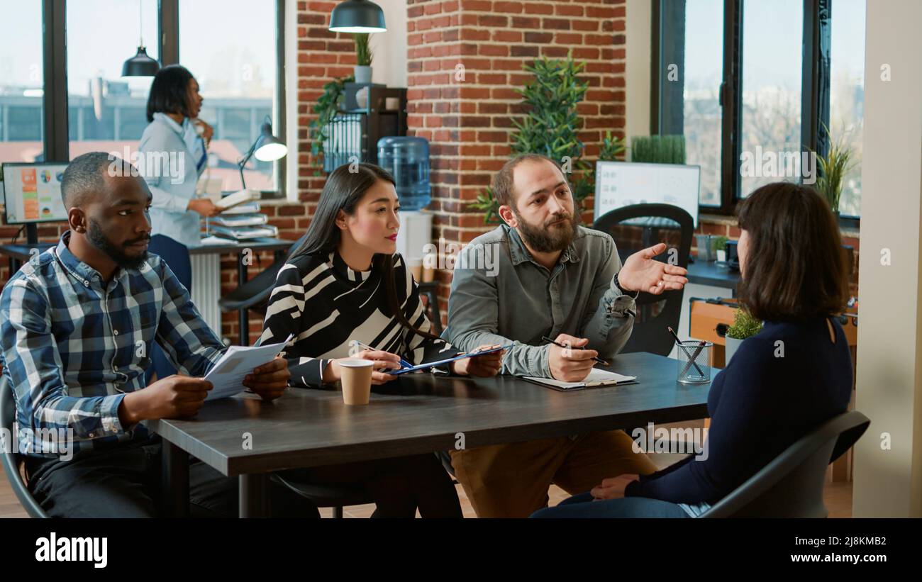 Diverse group employees talking applicant hi-res stock photography and ...