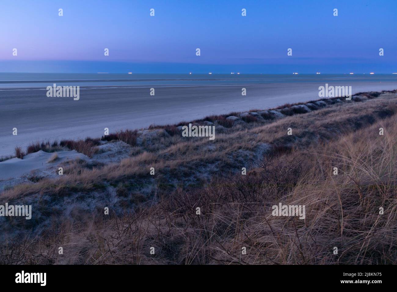 Sandy beach on east frisian island at dawn Stock Photo - Alamy