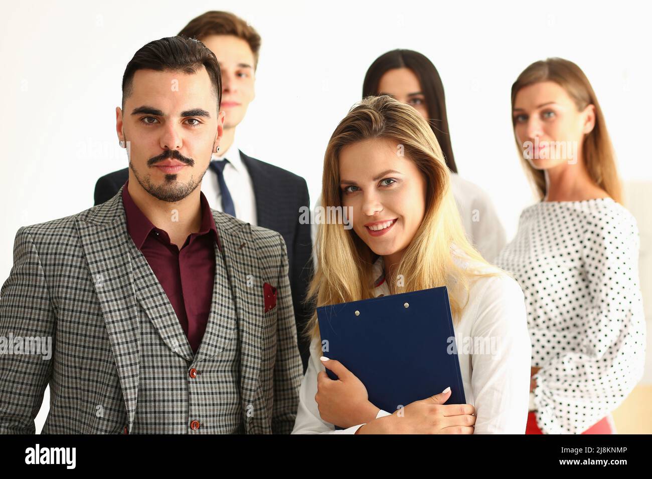 Confident team people posing for collective picture, coworkers look ...