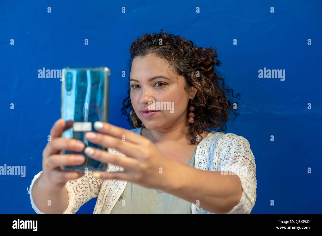 Isolated female hand selfie hi-res stock photography and images - Alamy
