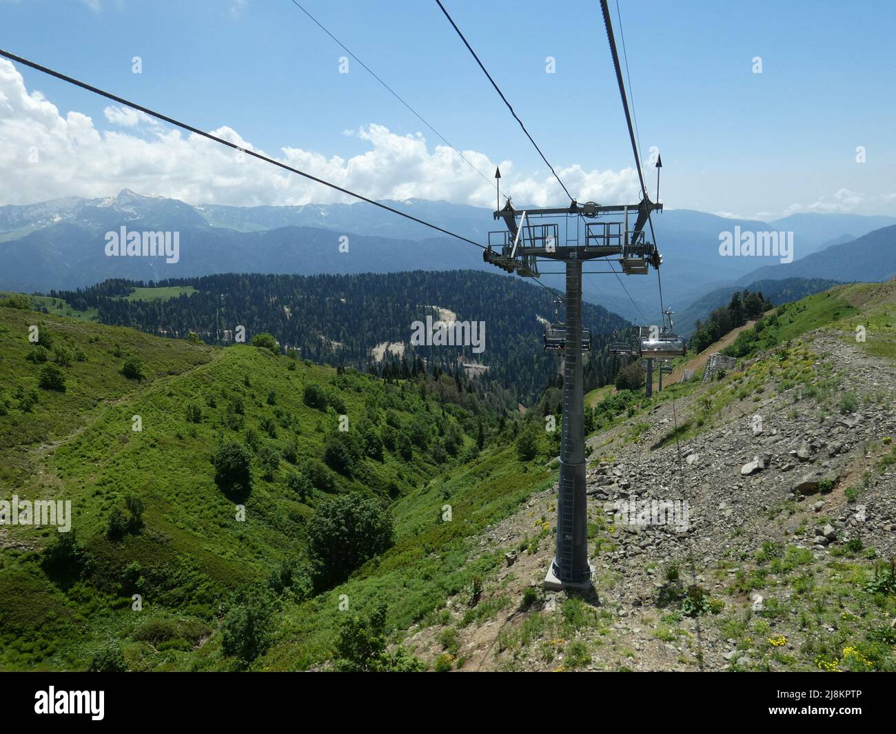Cable way in mountains. Sunny summer day Stock Photo - Alamy