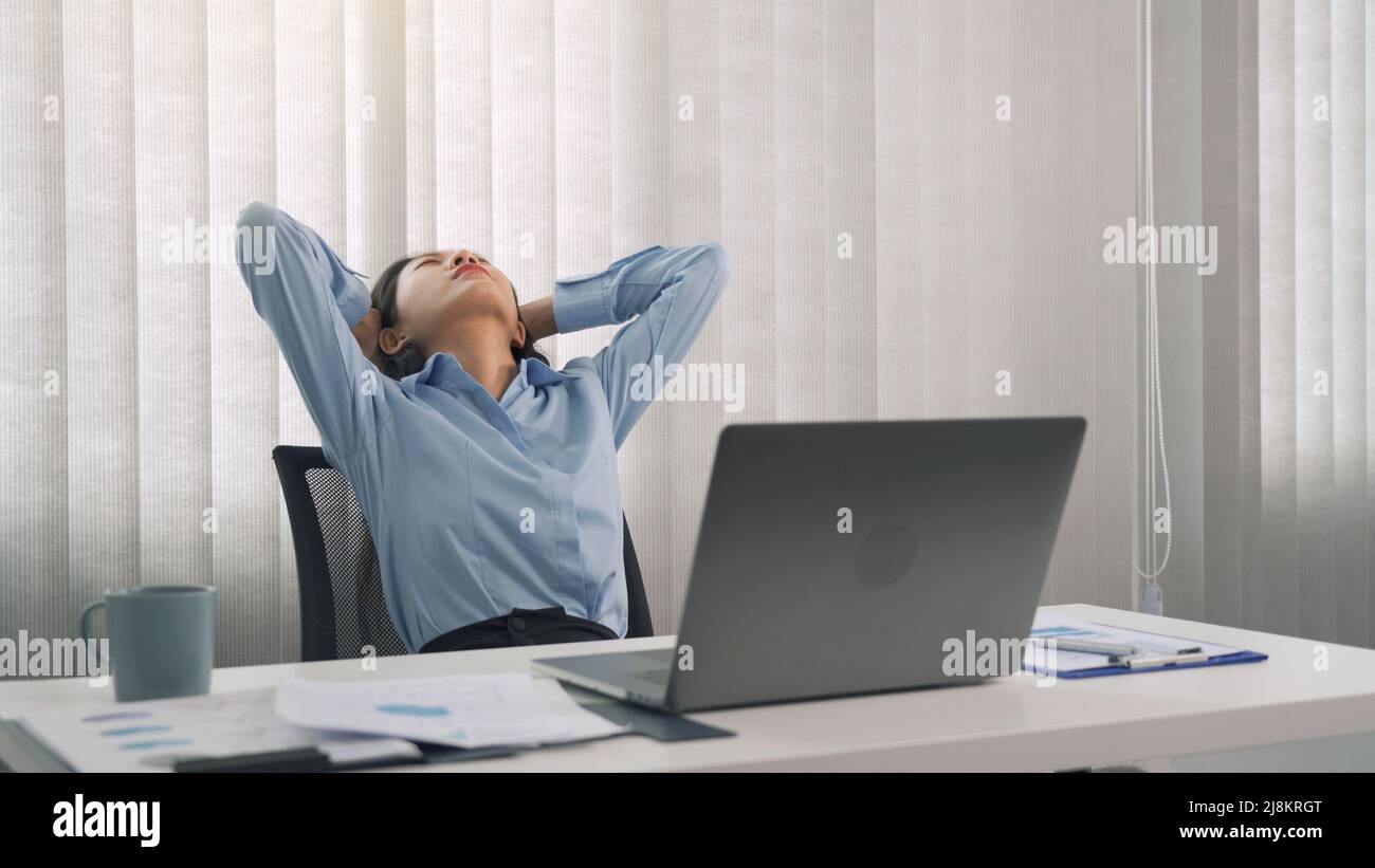 Young asian women are annoyed and stressed about doing their work that ...