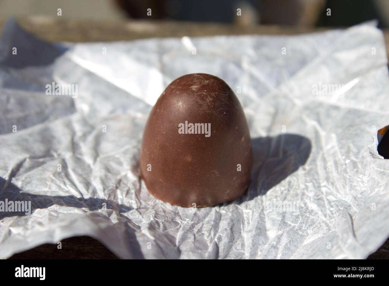 one candy on paper Stock Photo - Alamy